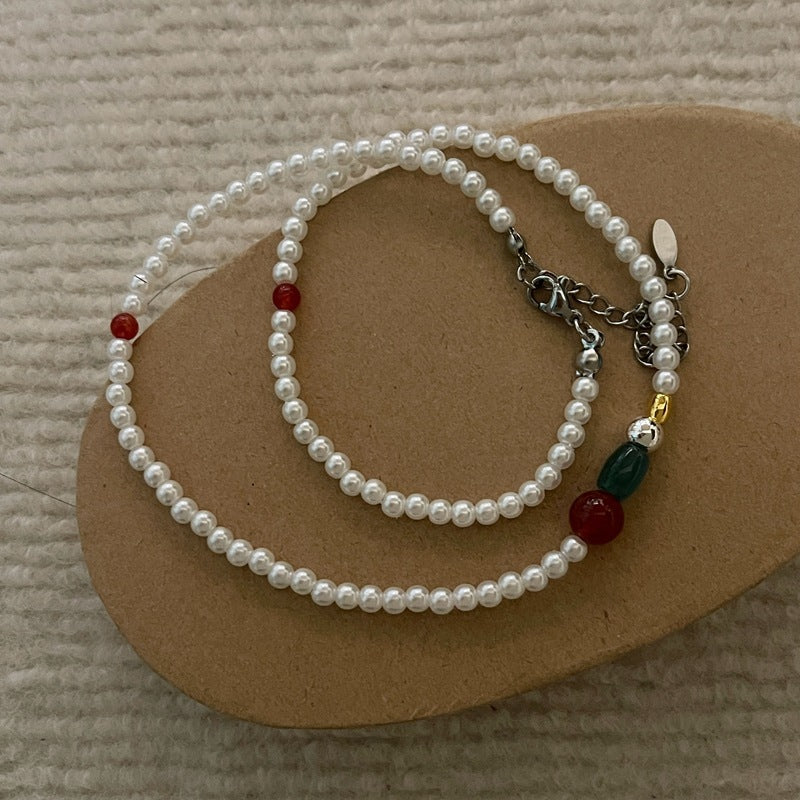 Red and green pearl necklace store